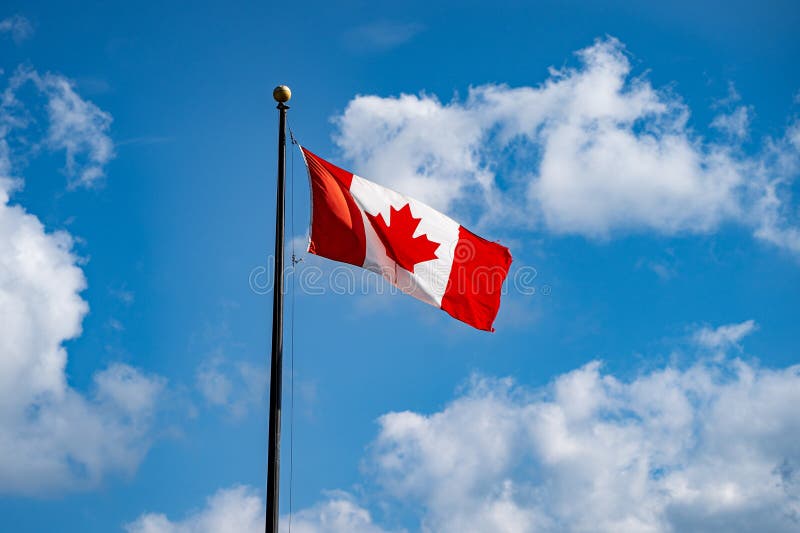 Waving Canadian Flag and Cloudy Blue Sky Stock Image - Image of tourism ...