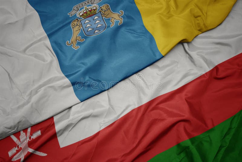 Waving Colorful Flag of Oman and National Flag of Canary Islands Stock ... Waving Colorful Flag of Oman and National Flag of Canary Islands Stock ...