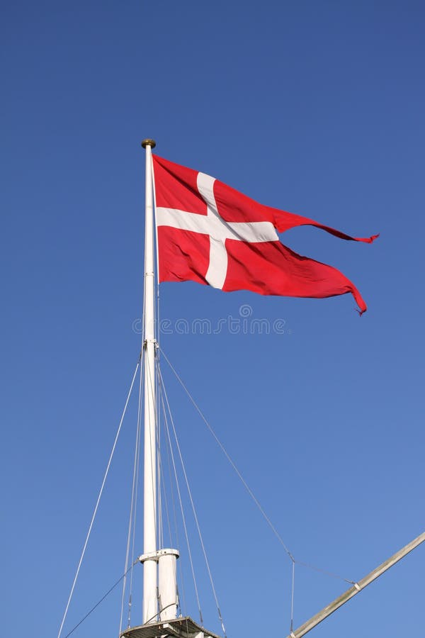 Waving Danish Royal Flag with Blue Sky and Copy Space Stock Photo ...