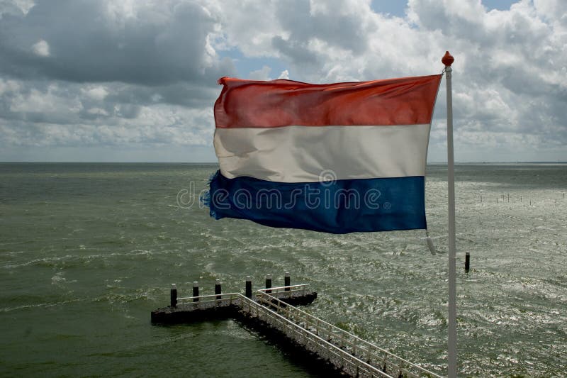 Waving dutch flag stock photo. Image of clouds, lake, holland - 7970312