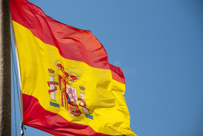 Flag of Spain on a pole stock photo. Image of yellow - 135930612