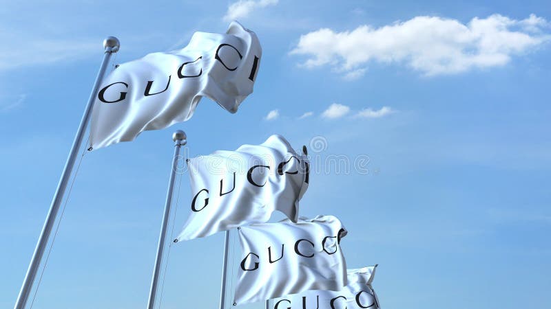 Waving Flags with Gucci Logo Against Sky, Seamless Loop. 4K Editorial ...