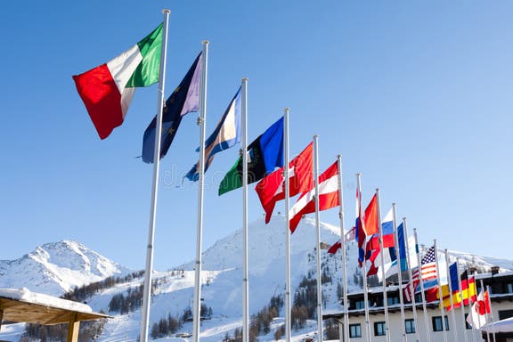 Waving flags in the snow - stock photo. Image of europe - 17675624