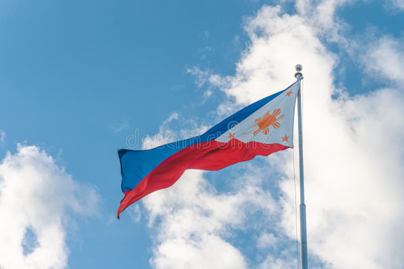 Waving Philippine Flag in a Flagpole Stock Image - Image of clouds ...