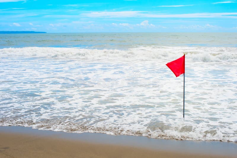 Waving Red Flag at Seashore Stock Image - Image of sand, danger: 140923365