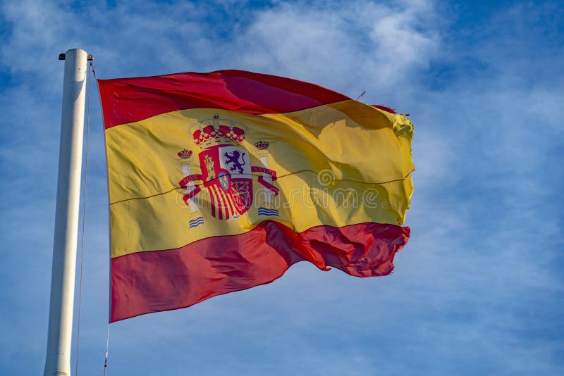 Waving spanish flag on sky stock photo. Image of color - 143932850