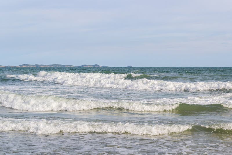 Waving water on the beach stock image. Image of blue - 80843625