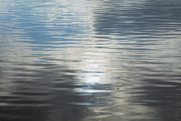 Wavy lake surface. stock photo. Image of skyscape, surface - 303108820