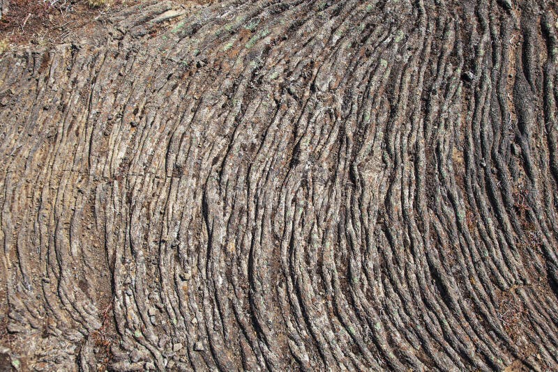Wavy lava rock formation stock image. Image of volcano - 59702249
