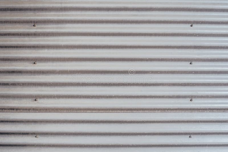 Wavy Metal Background on a Gray Wall Stock Photo - Image of detail ...