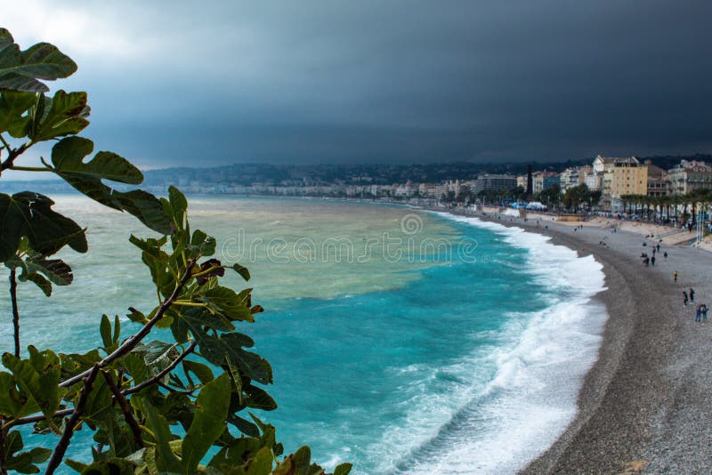 Wavy Ocean Hitting the Sandy Beach in Nice, France Stock Photo - Image ...