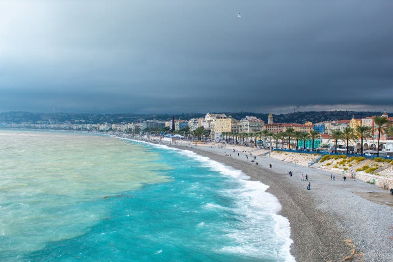 Wavy Ocean Hitting the Sandy Beach in Nice, France Stock Photo - Image ...