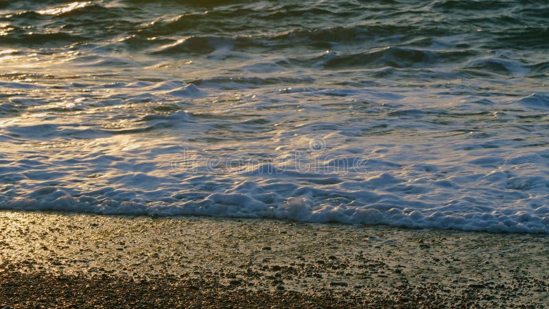 Wavy Orange Rippling Sea Water. Glittering Sea Surface. Sunlight Makes ...