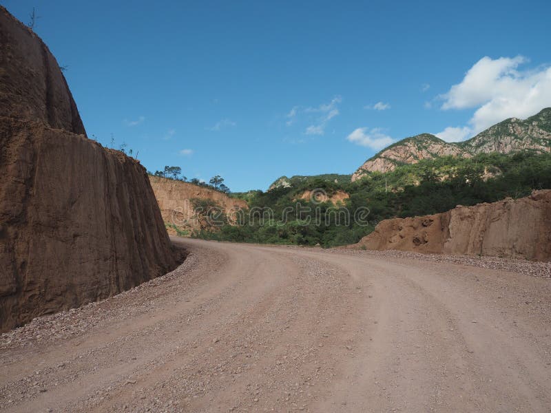 The Wavy Road between Rocky Cliffs on a Sunny Day Stock Image - Image ...