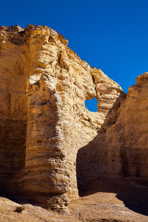 Pillars of White Rock in Flat Desert with Vibrant Blue Sky Stock Image ...