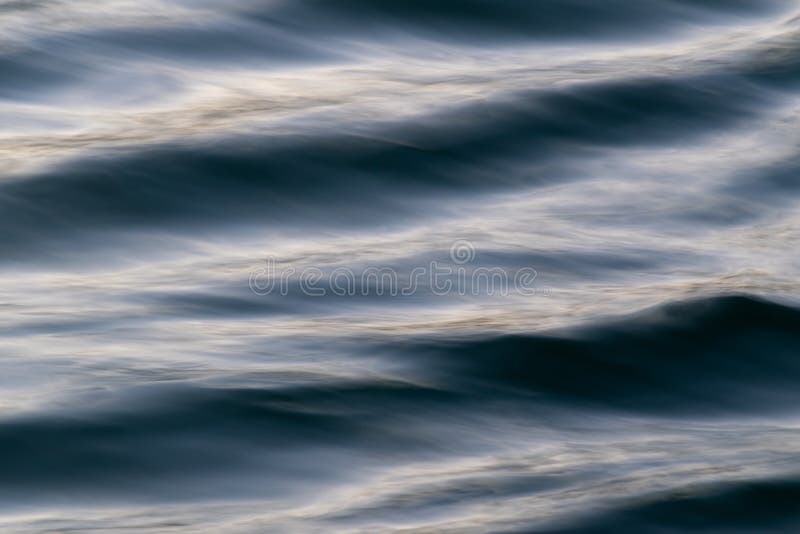 Wavy Water Surface in Close Up Stock Photo - Image of light, diagonal ...