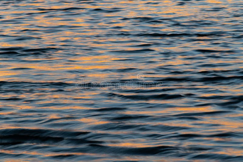 Wavy Water Surface during Sunset Stock Photo - Image of tranquil, scene ...