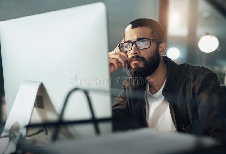 The only Way To Get those Goals Smashed. a Young Businessman Using a ...