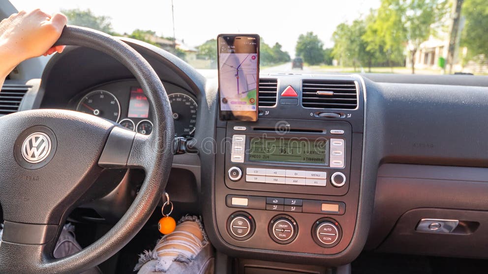 Waze Maps Showing the Way Thru the City. Driver Using Waze Maps ...