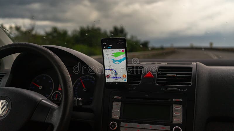 Waze Maps Showing the Way Thru the City. Driver Using Waze Maps ...