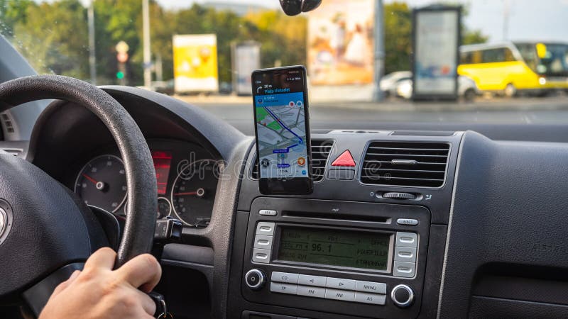 Waze Maps Showing the Way Thru the City. Driver Using Waze Maps ...