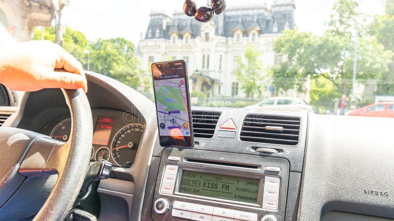 Waze Maps Showing the Way Thru the City. Driver Using Waze Maps ...