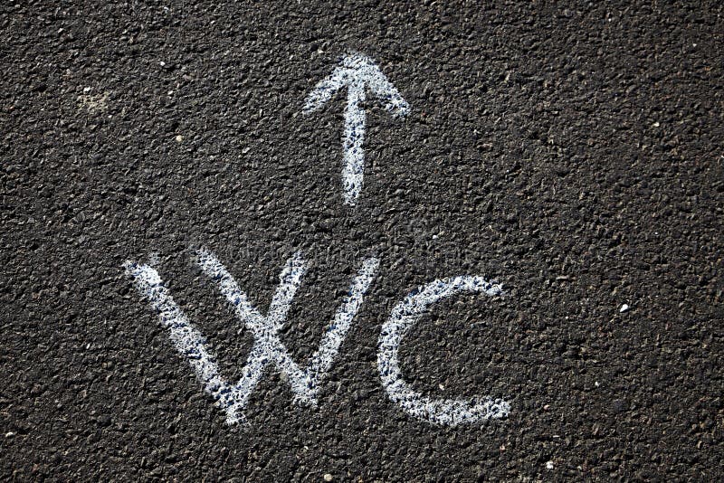 WC sign stock image. Image of direction, pavement, arrow - 13542867