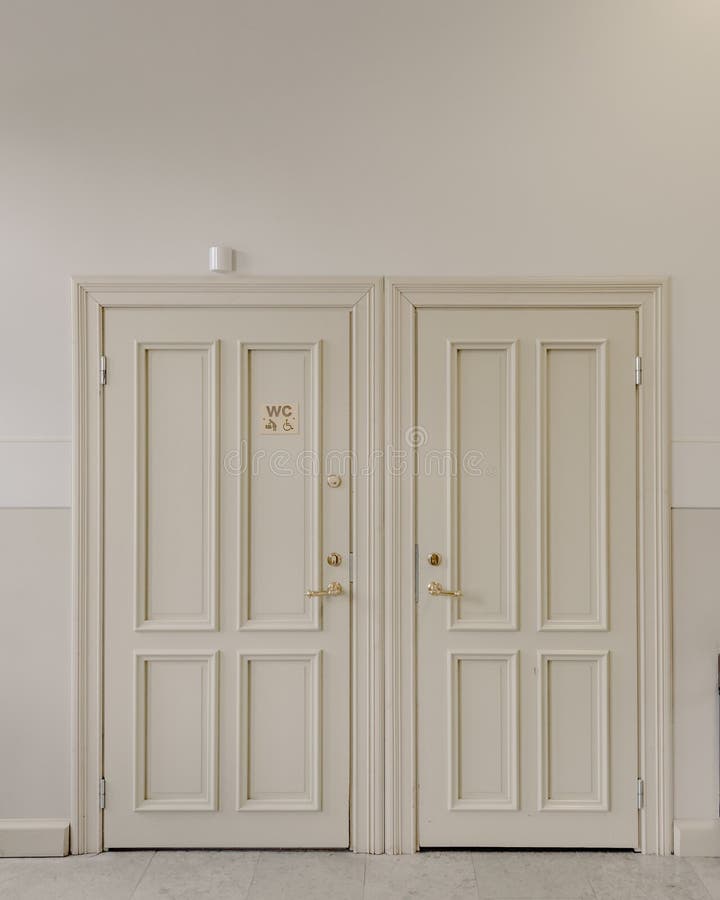 WC wooden doors stock image. Image of indoor, empty - 140313597