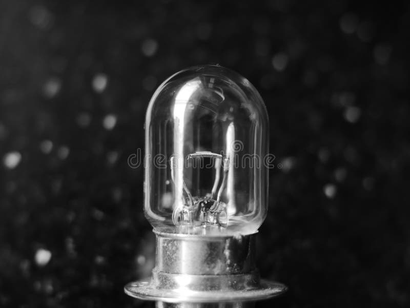 Weak Yellow Bulb Light on Black Background Editorial Stock Photo ...