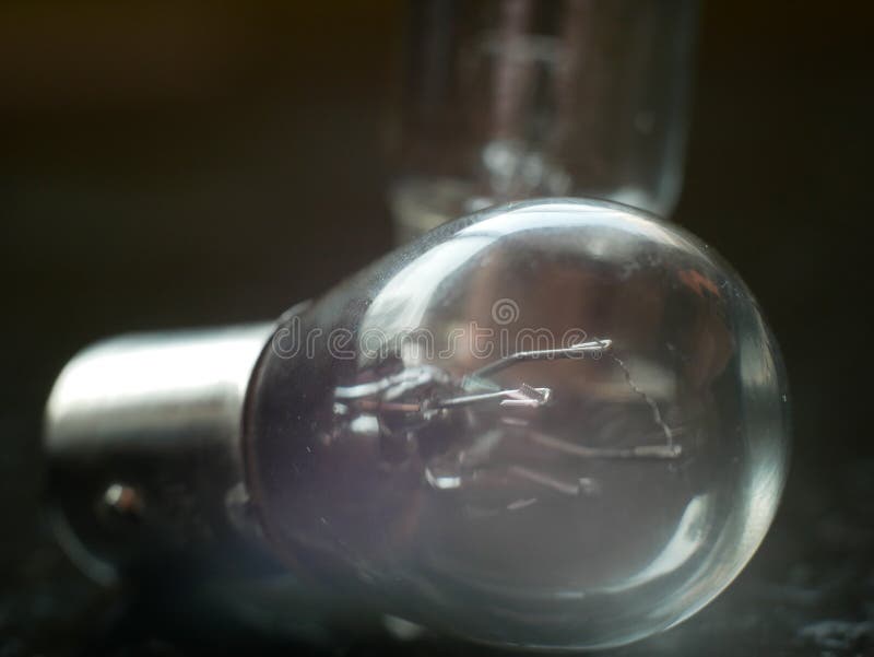 Weak Yellow Bulb Light on Black Background Stock Image - Image of black ...