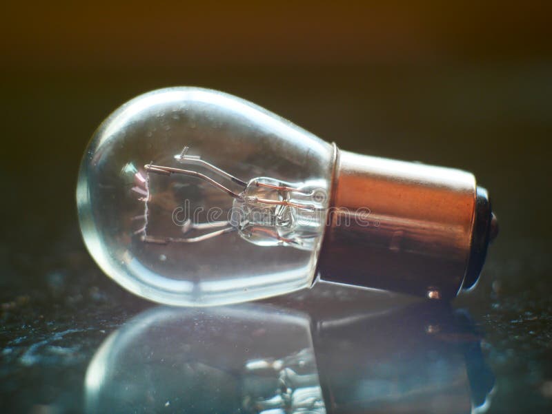 Weak Yellow Bulb Light on Black Background Stock Photo - Image of ...