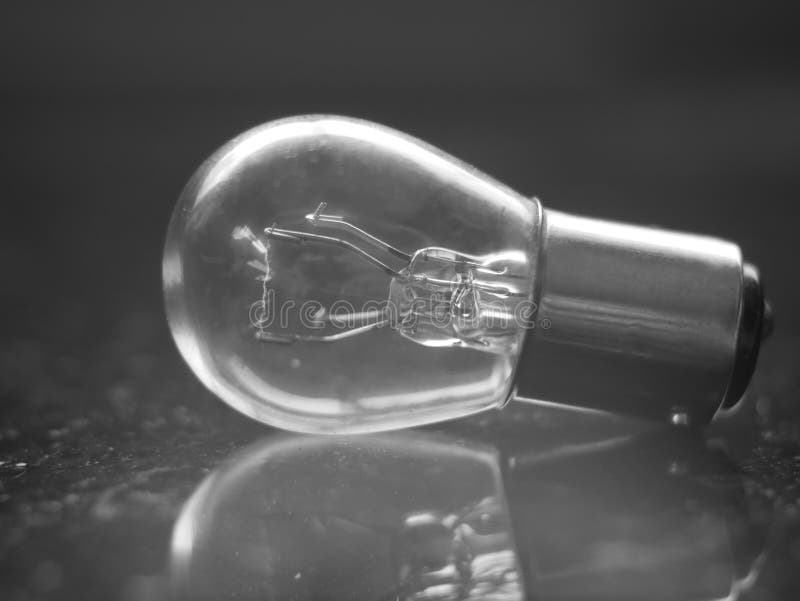 Weak Yellow Bulb Light on Black Background Stock Image - Image of idea ...