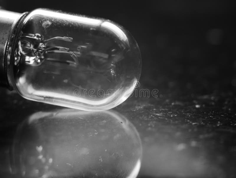Weak Yellow Bulb Light on Black Background Stock Photo - Image of ...