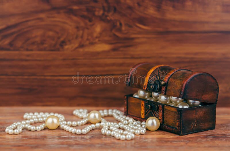 Wealth in the Chest. Chest on a Wooden Background Stock Image - Image ...