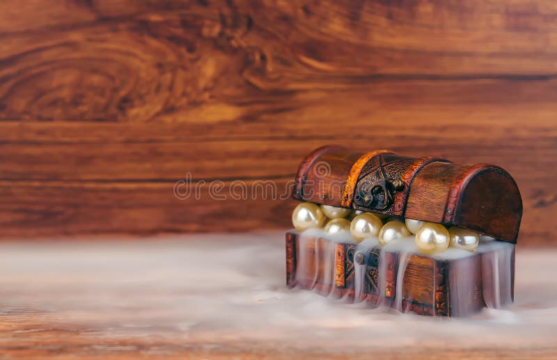 Wealth in the Chest. Chest on a Wooden Background Stock Photo - Image ...