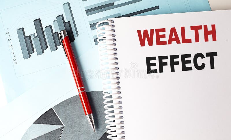 Wealth Effect Concept with Text on a Notebook, Red Pen, and Financial ...