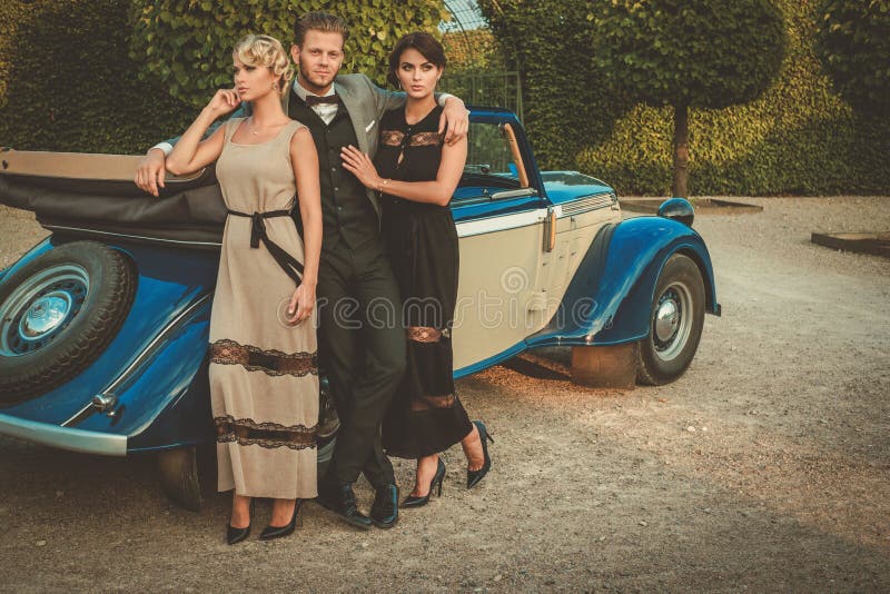 Wealthy Young Friends Near Classic Convertible Stock Image - Image of ...