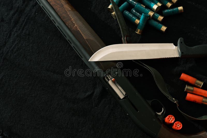 Weapon on Black Cloth: Knife, Rifle, Shells,top View. Top View of Knife ...