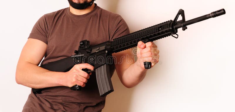 Weapon in hands stock photo. Image of mission, paintball - 14994066