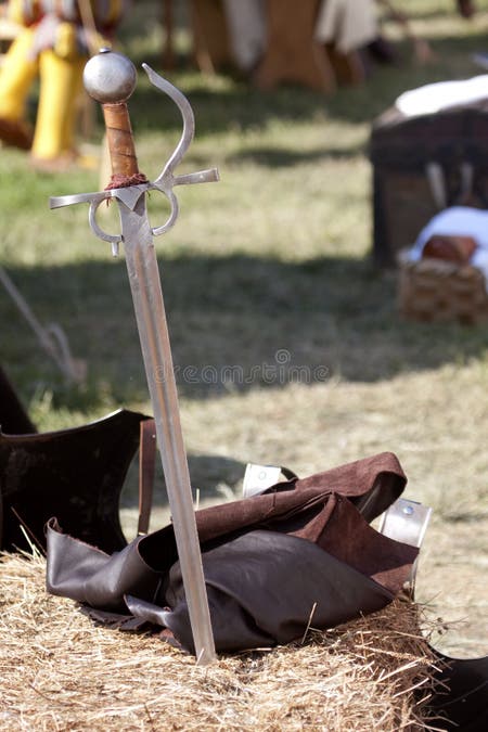 Weapons and Armors: the Sword in the Straw. Stock Image - Image of ...