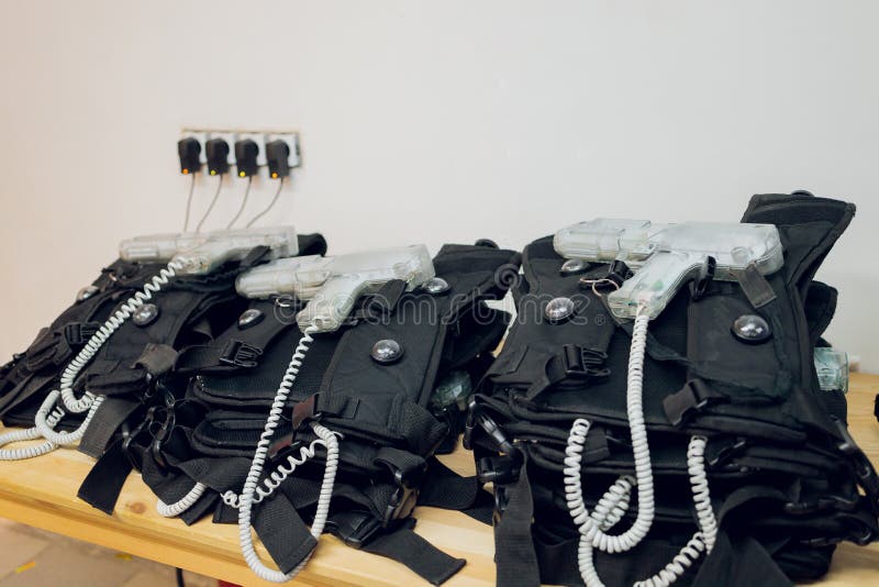 Weapons Close-up on a Military Man Standing Inside the Building and ...