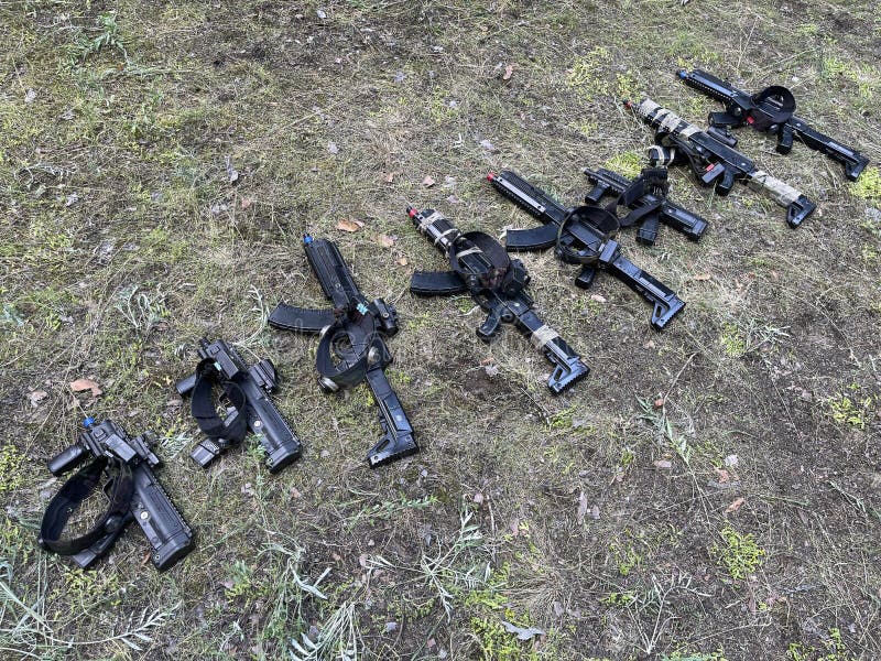 Weapons for Laser Tag Game on the Ground in Forest Stock Image - Image ...