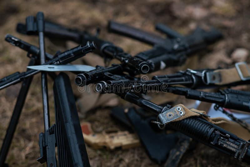 Weapons Lie on the Ground. the Disarmament. Lay Down Arms. Stock Image ...