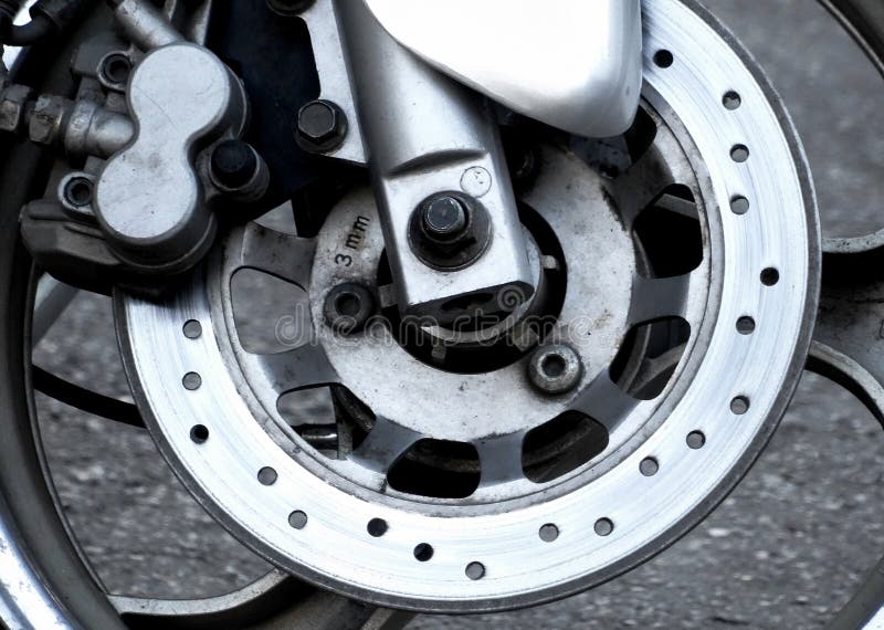 Wear Brake Disc on the Front Wheel of Motorcycle Stock Image - Image of ...