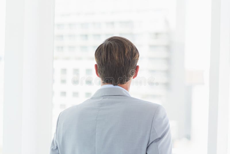 Wear View of Businessman Looking Across Window Stock Image - Image of ...