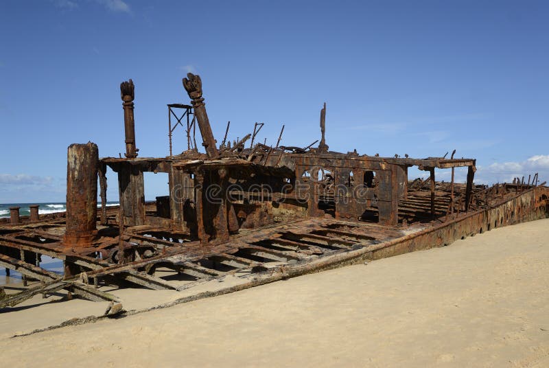Weark on a sandy beach stock image. Image of rust, clouds - 23058669