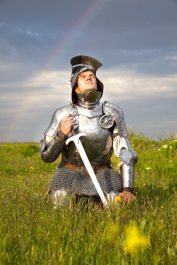 Weary Knight, after the Battle / Rain and Rainbow Stock Photo - Image ...
