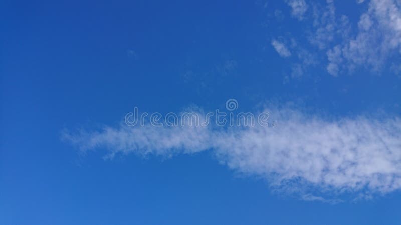 Weather. Blue Sky Light Wind Blown Clouds Stock Photo - Image of blown ...