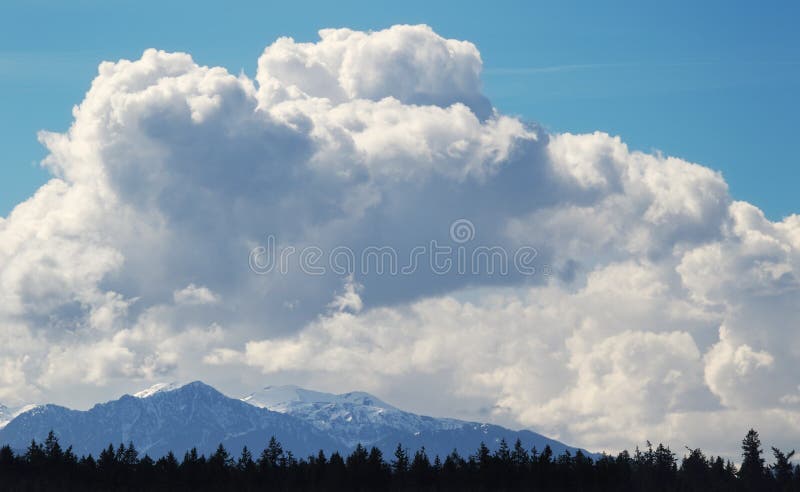 Weather System Over Mountains Stock Photo - Image of weather, capped ...