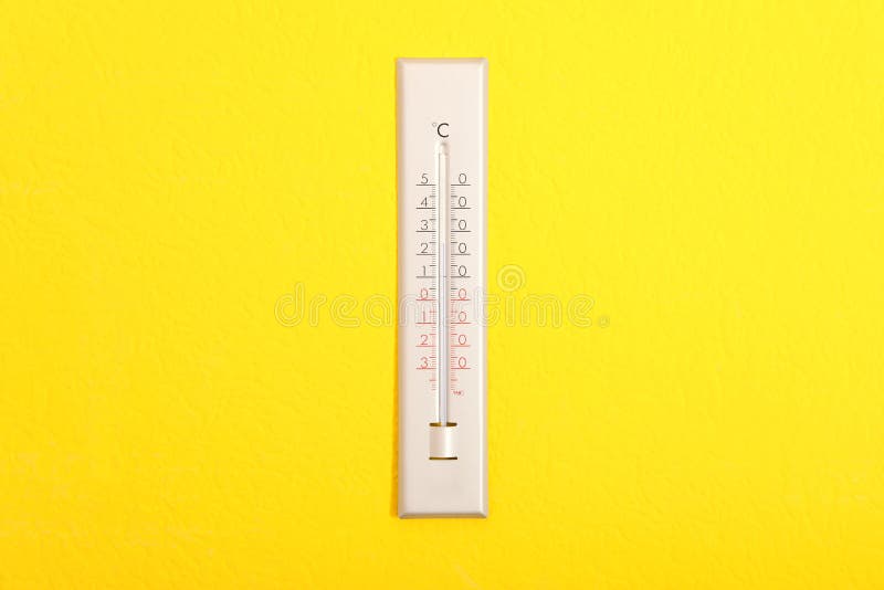 Weather Thermometer Hanging on Bright Yellow Wall Stock Photo - Image ...